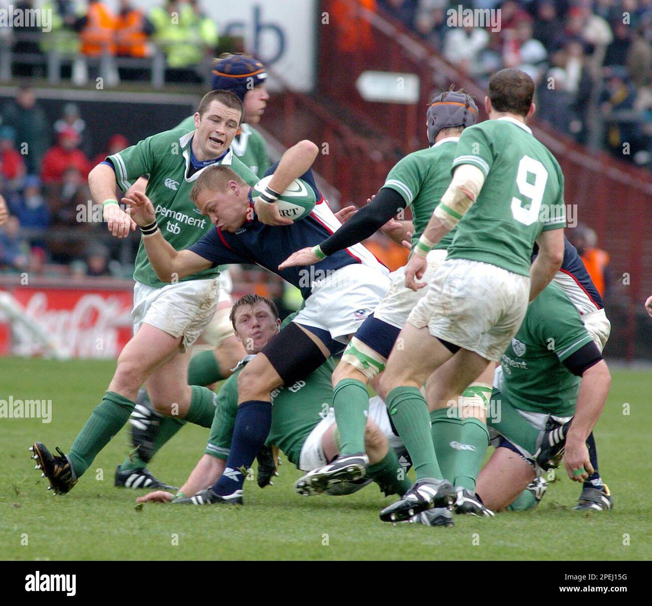 Jacob Waasdorp of the U.S.A is stopped by the Irish pack during their ...