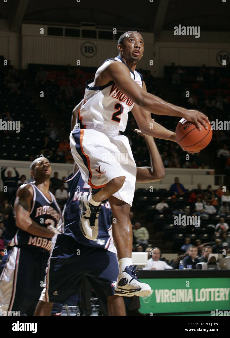 Virginia's J.R. Reynolds takes it to the hoop over Robert Morris ...