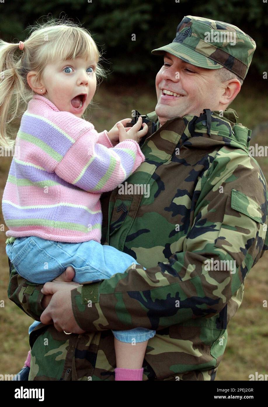 Sgt. Tim Copeland of Barre, Vt. gets a reaction from his daughter ...