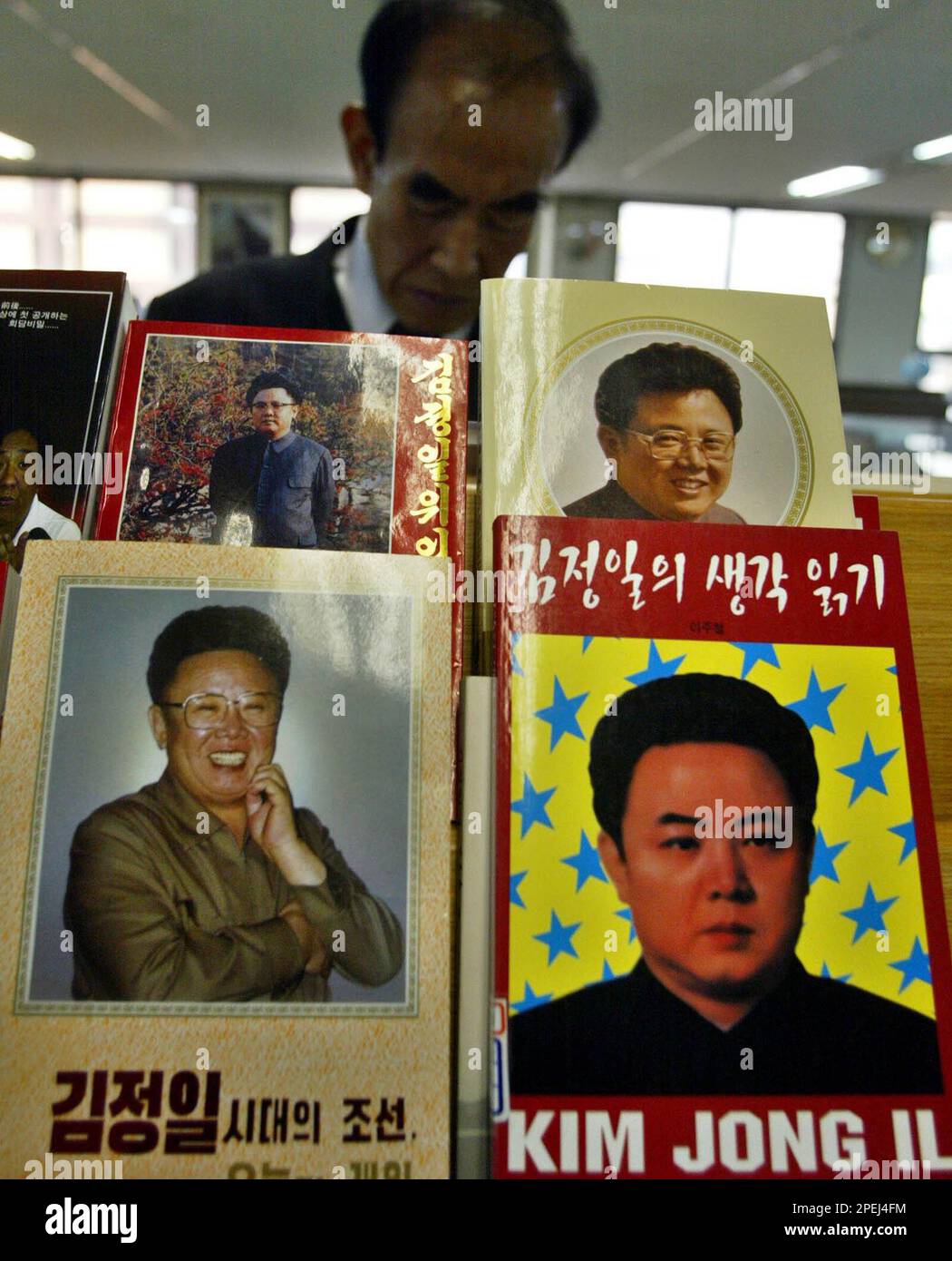 A South Korean Kim Jong-su,72, looks at North Korea magazines at the ...