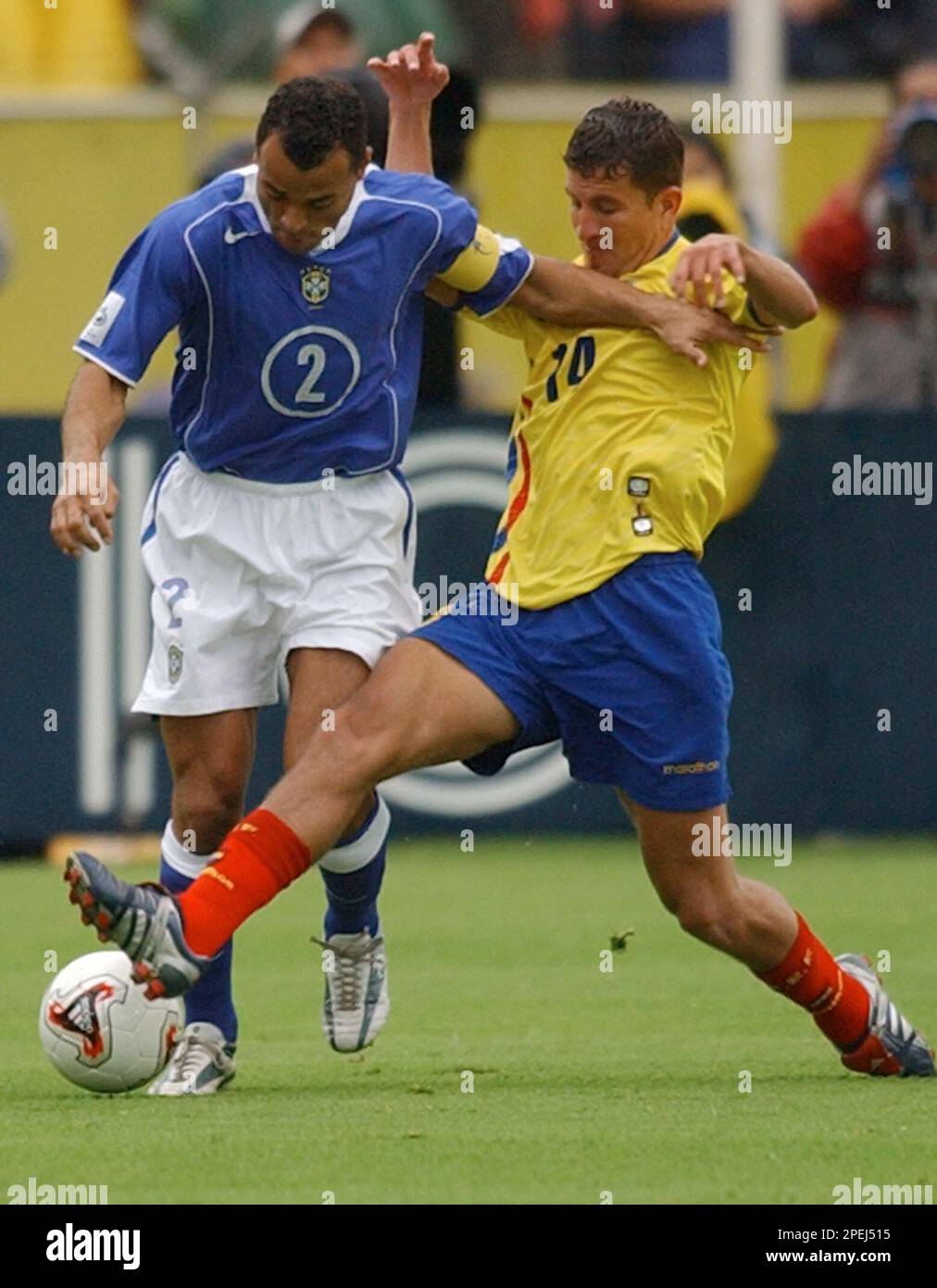 Brazil's Cafu, left, tries to controls the ball under pressure from ...