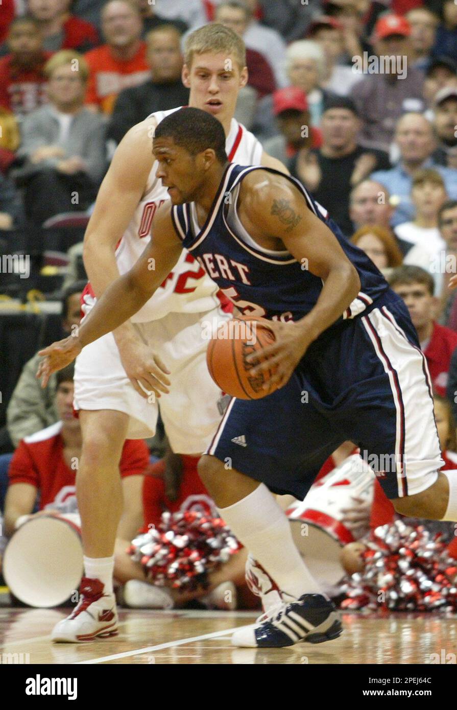 Robert Morris' Mark Anderson, front, tries to get around Ohio State's ...