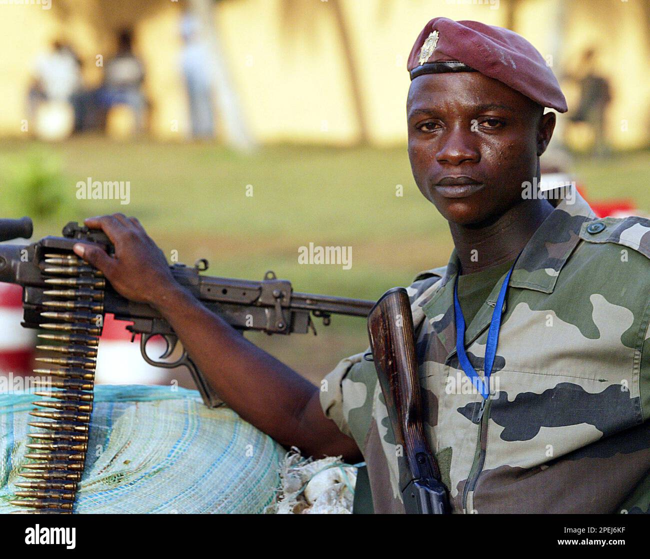 An Ivory Coast soldier stands guard at the Presidency in Abidjan ...