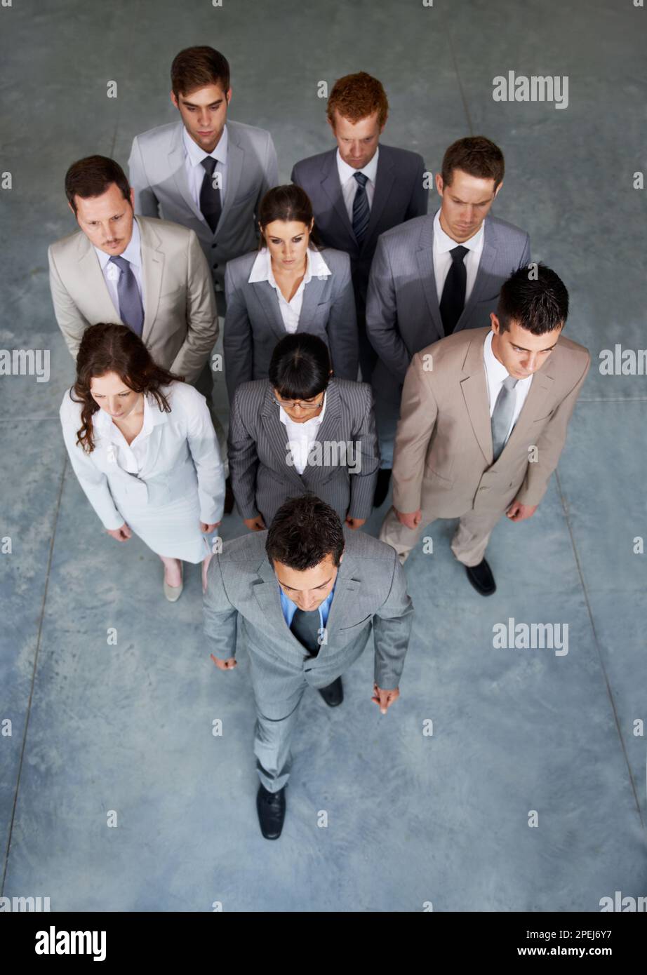 Driven and determined. Top view of a group of young businesspeople ...