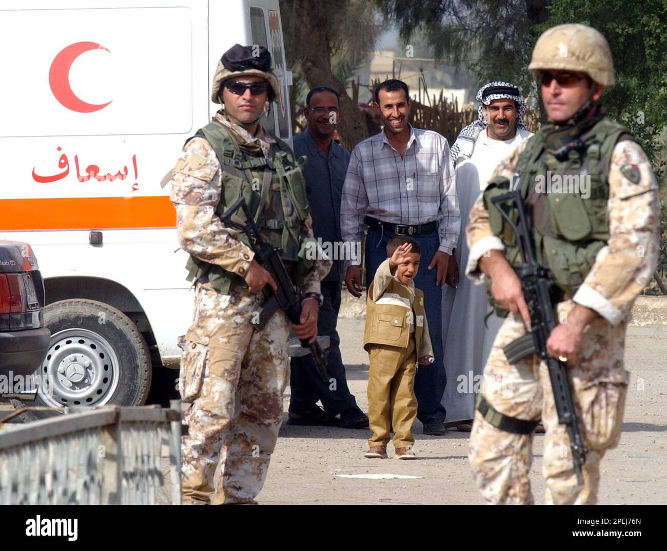 Italian soldiers patrol outside the former "Saddam Hussein" hospital in ...