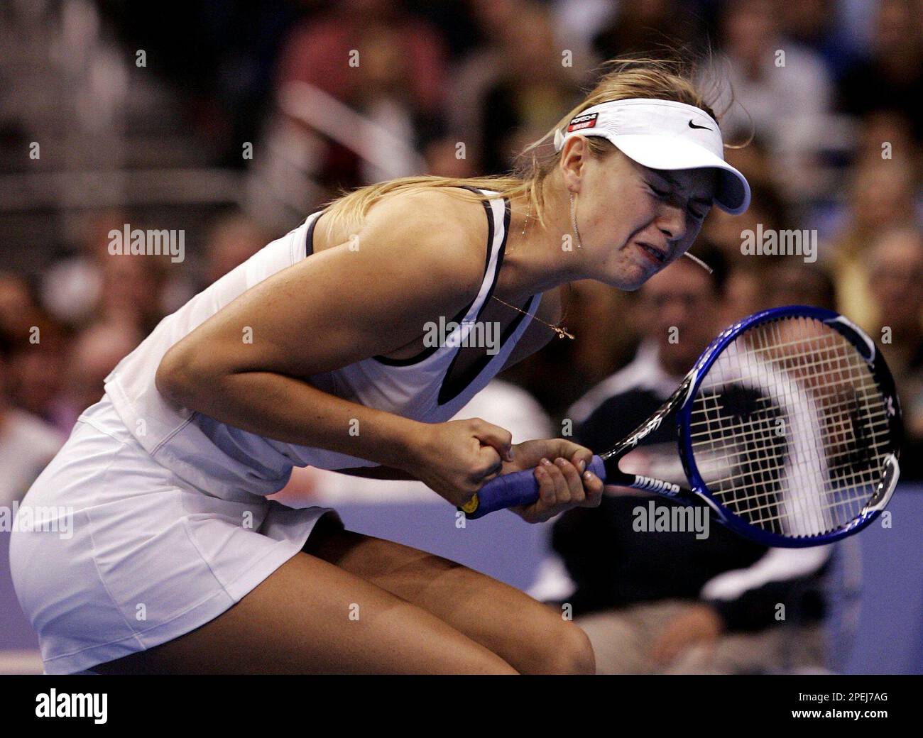 Russia's Maria Sharapova exhults after winning a game in the third set ...