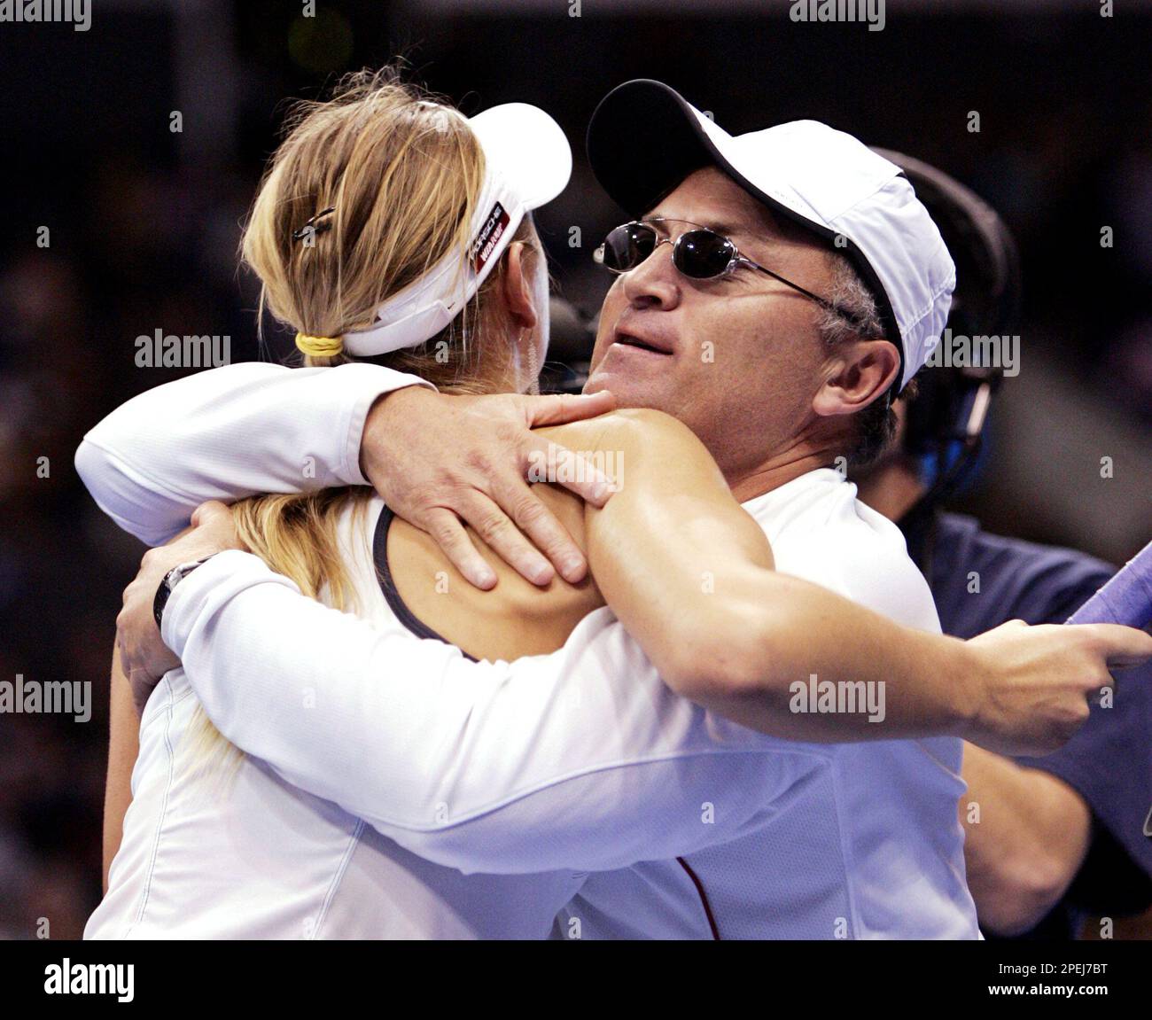 Russia's Maria Sharapova hugs her father Yuri Sharapova after defeating ...