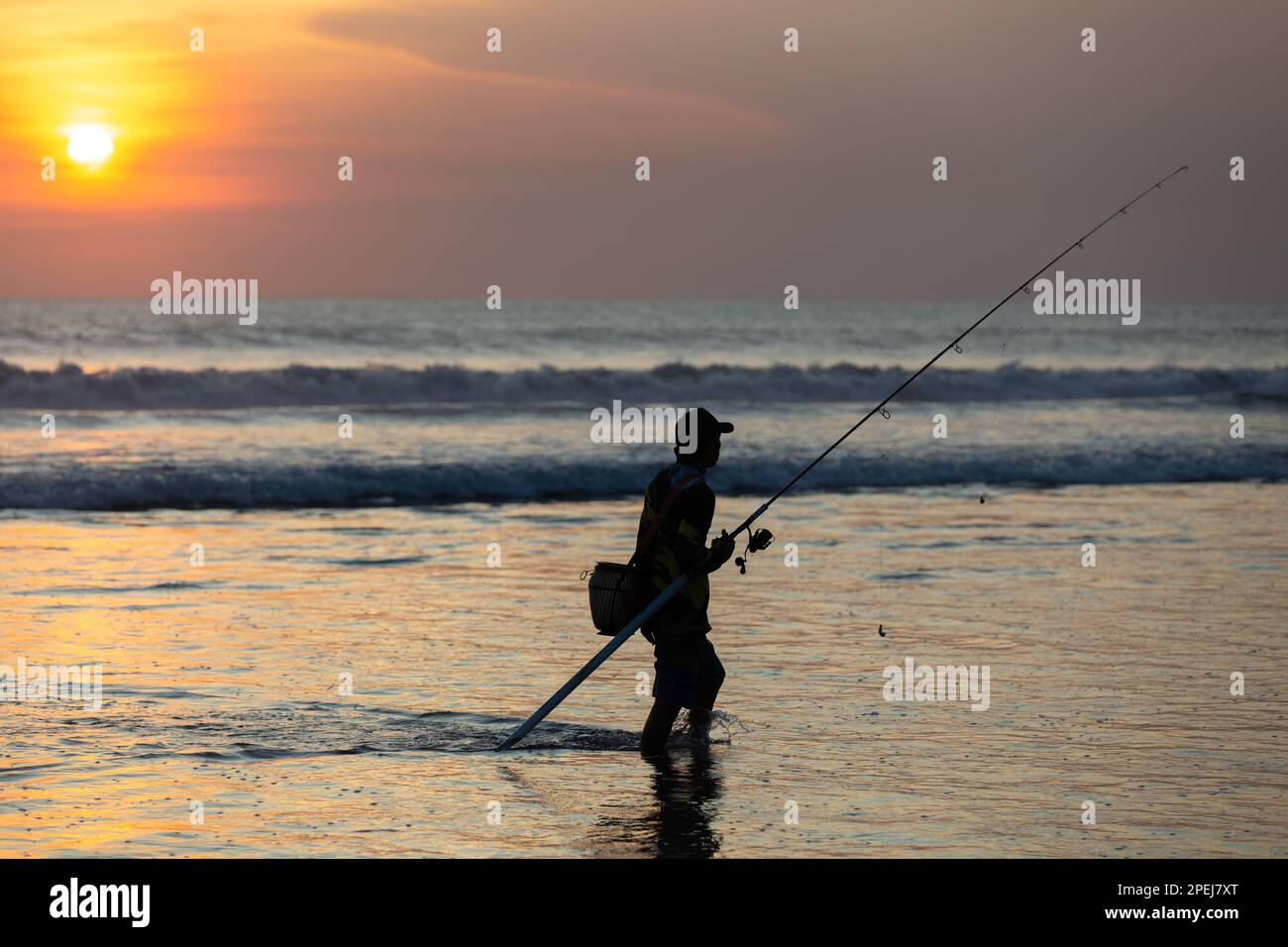 Person fishing in the ocean hi-res stock photography and images - Alamy
