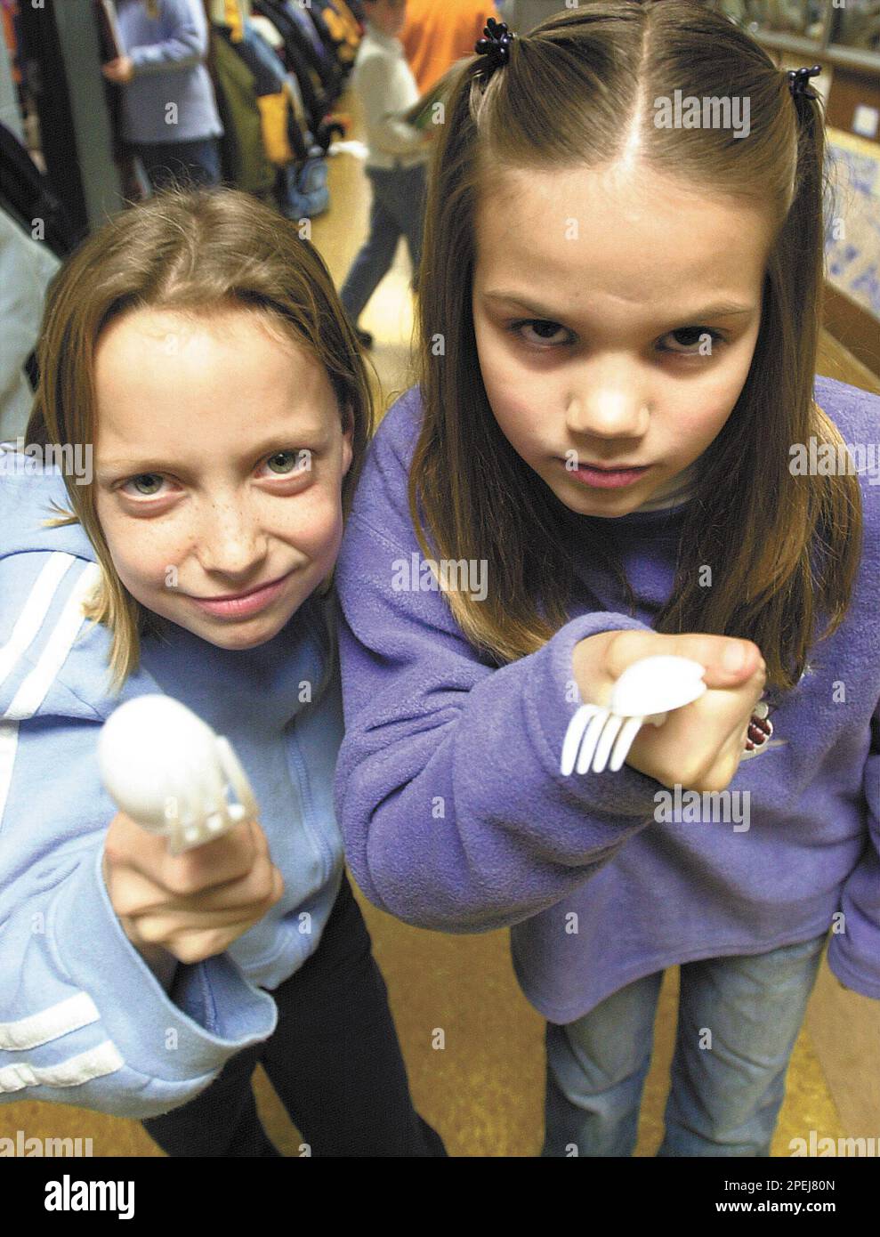Fifth-graders Haley Allen, left, and Courtney Kriesel of Trempealeau ...