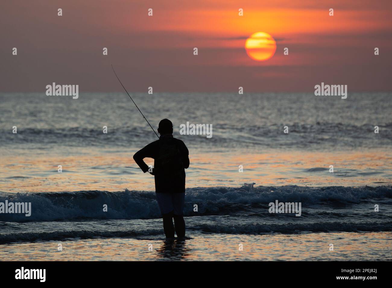 Person fishing in the ocean hi-res stock photography and images - Alamy
