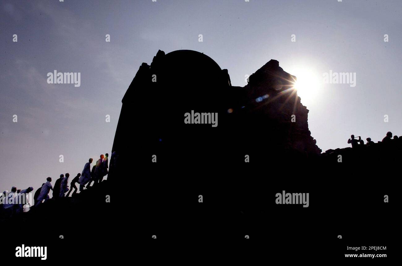 Muslim devotees arrive at the Feroz Shah Kotla mosque to offer Eid Al ...