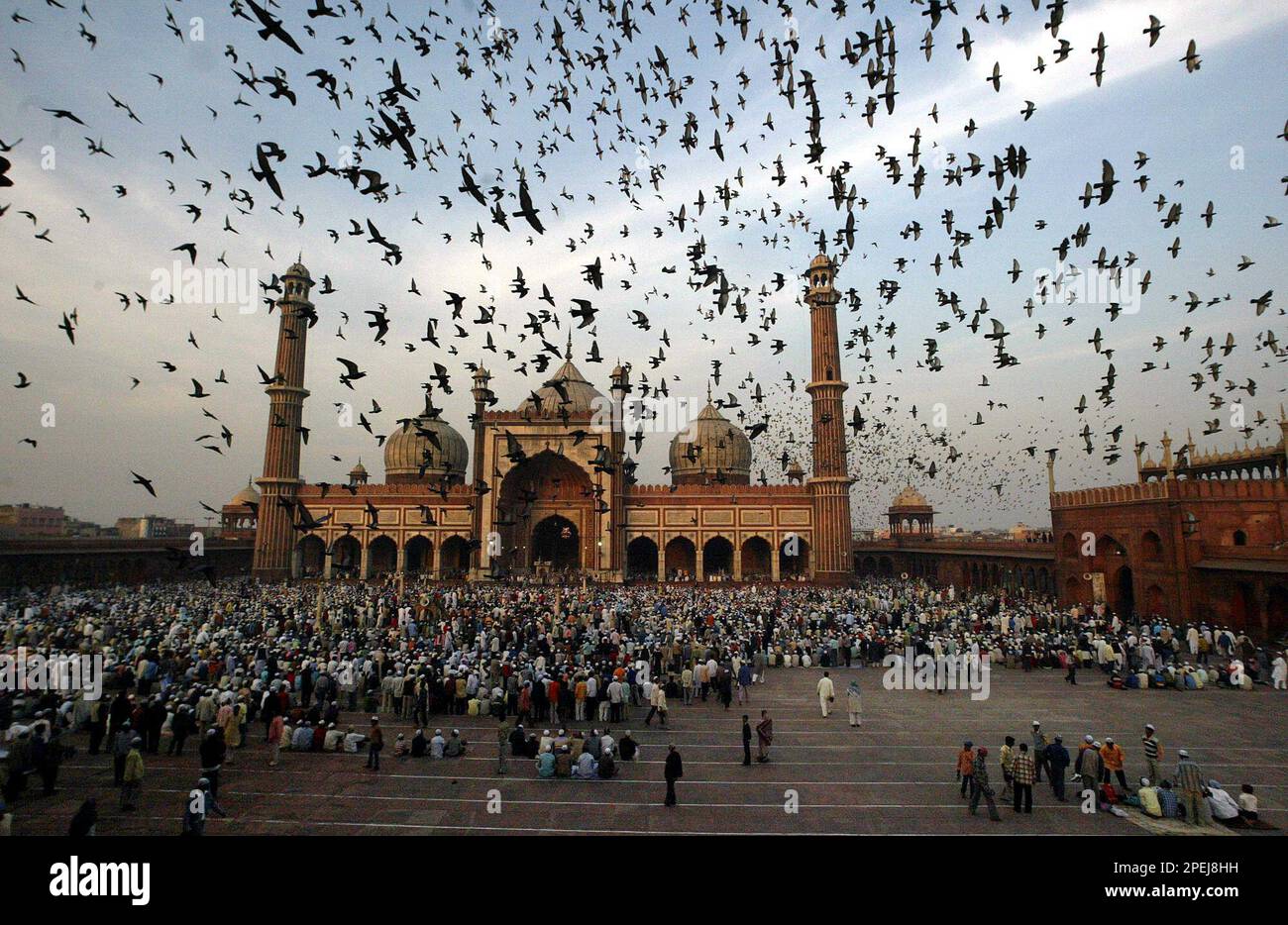 Muslim devotees congregate at the Jama Masjid for prayers in New Delhi ...