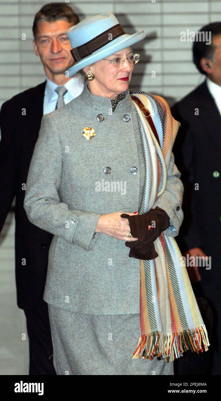 Denmark's Queen Margrethe II, accompanied by her husband Prince Henrik ...