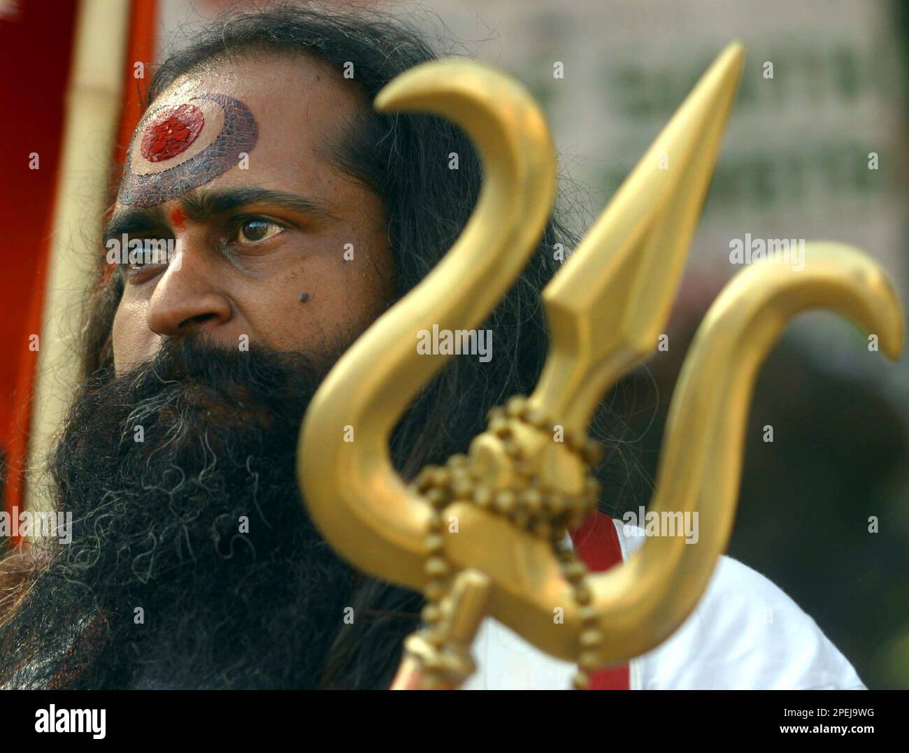 An Indian holy man, Sadhu Ravi Sankar participates in a protest meeting ...