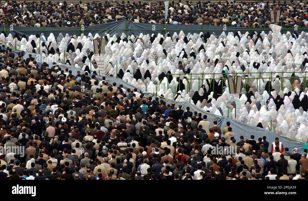 Iranian Muslims attend morning Eid prayers in Tehran Sunday, Nov. 14 ...