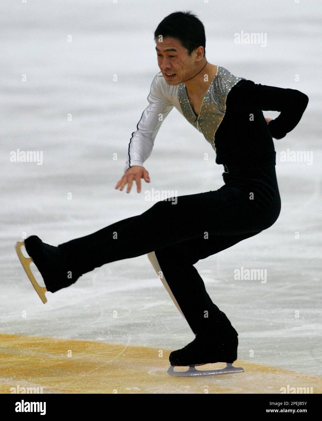 China's Li Chengjiang performs during the Men's Free Skating ...