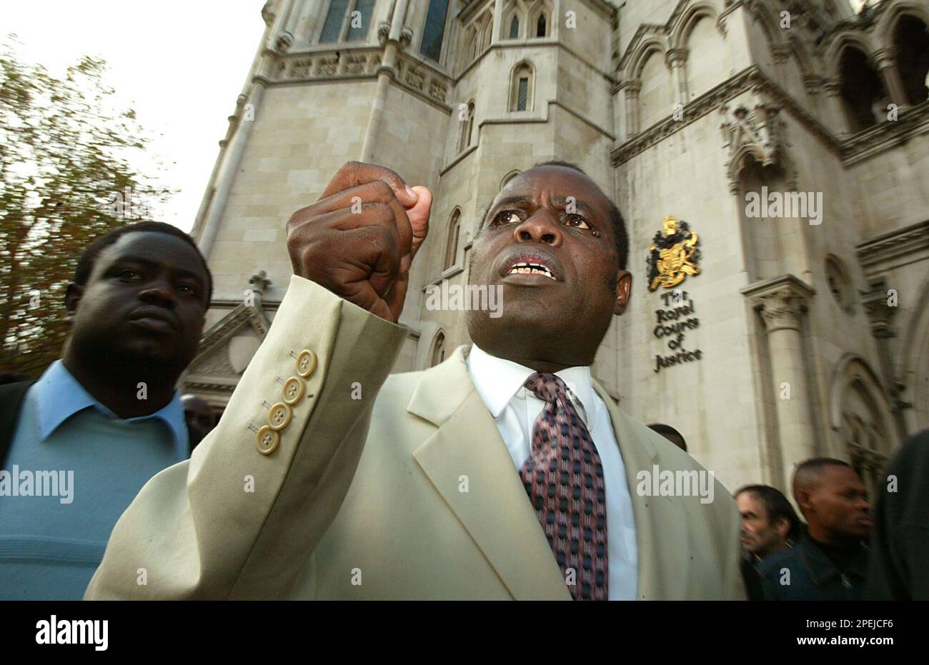 Self-styled archbishop, Gilbert Daya, speaking outside the Royal Courts ...