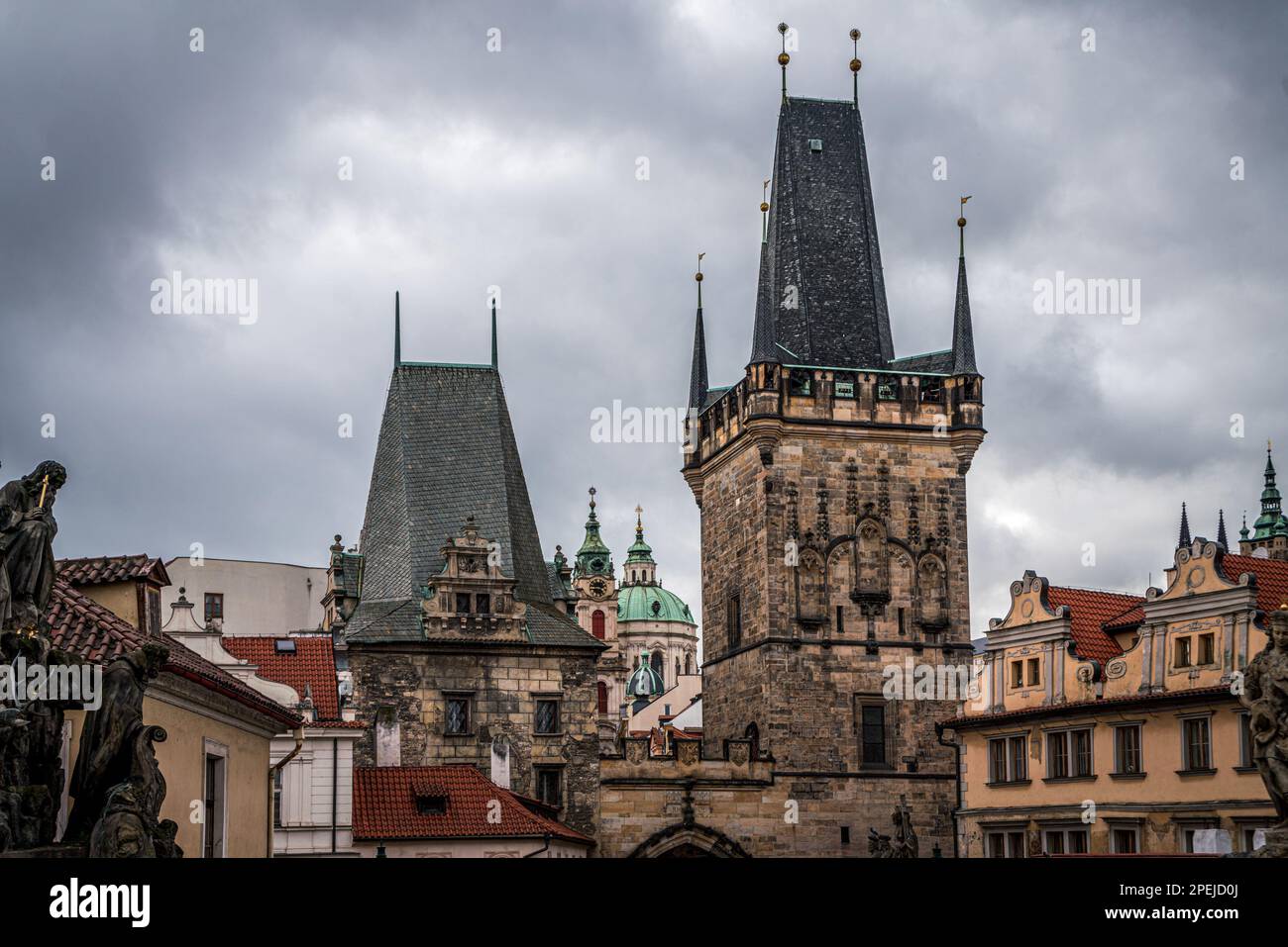 Old Town Bridge Tower on Charles bridge in Prague with dramatic clouds ...