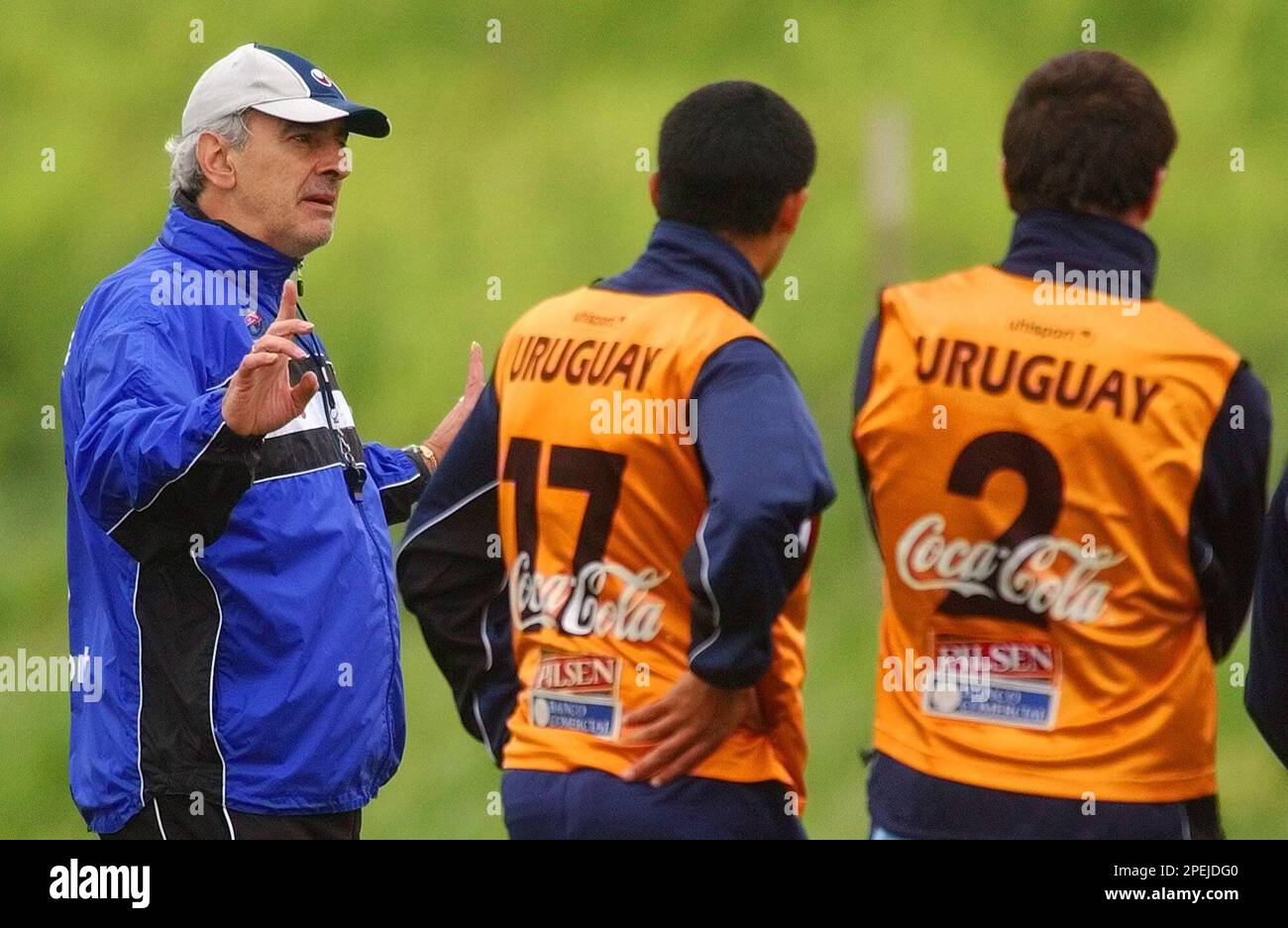 Uruguay's coach Jorge Fossati speaks to players during a training ...