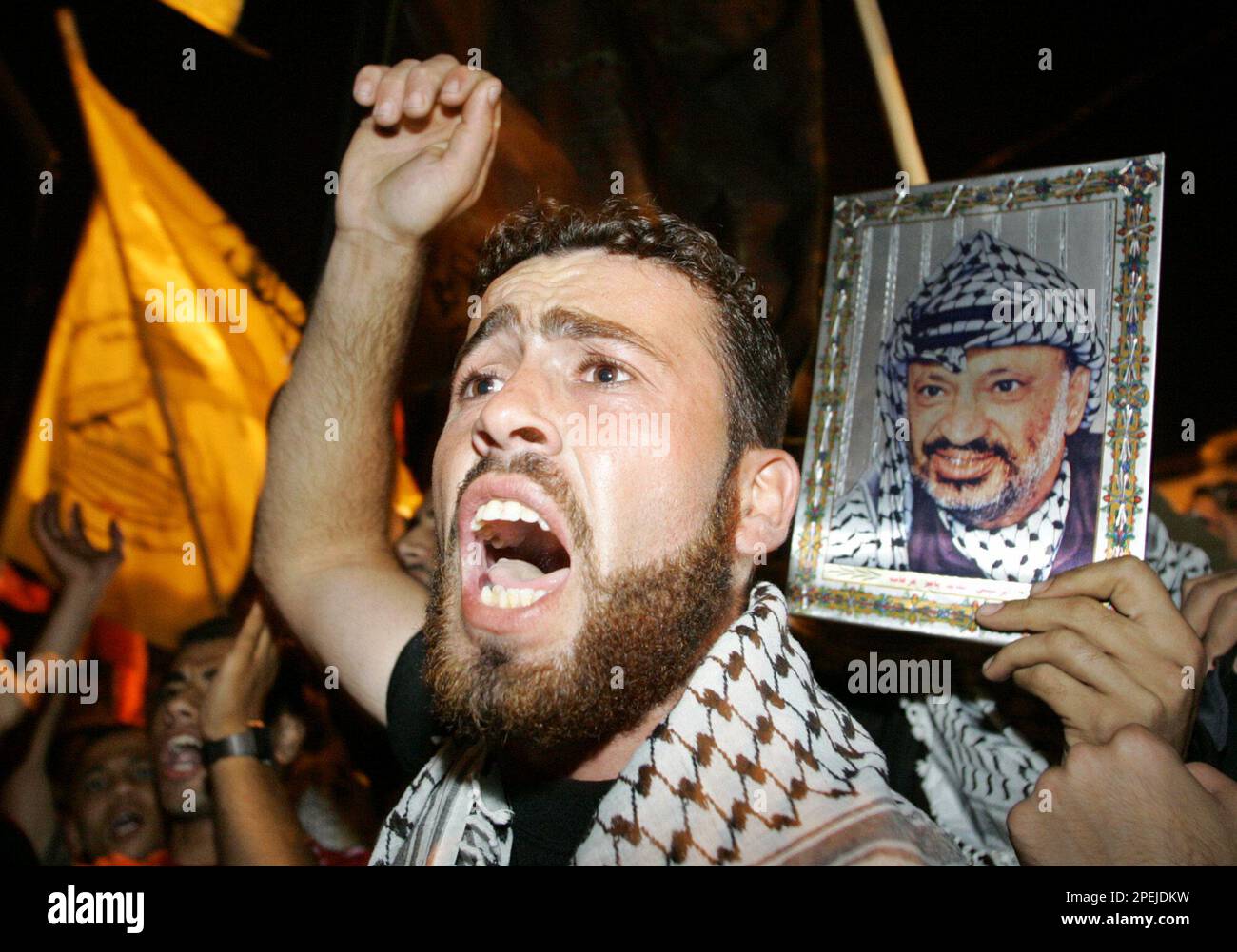A Palestinian man, member of Yasser Arafat's Fatah movement, chants ...
