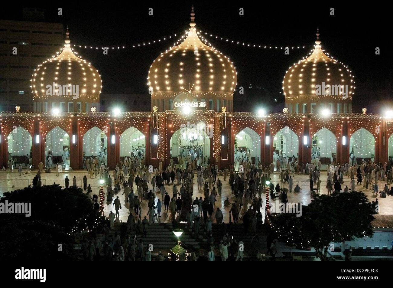 Muslim devotees arrive at central mosque of Karachi, Pakistan on ...