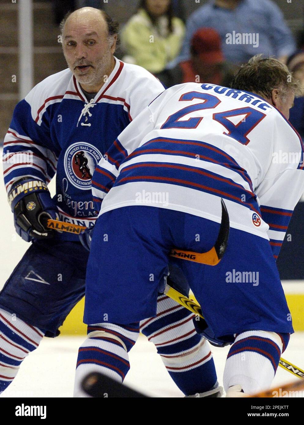 Original Six Legends Dave Williams,l eft, hooks Expansion Legends' Tony ...