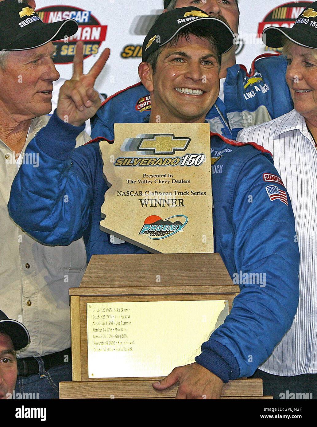 David Starr holds his trophy after winning the NASCAR Craftsman Truck ...