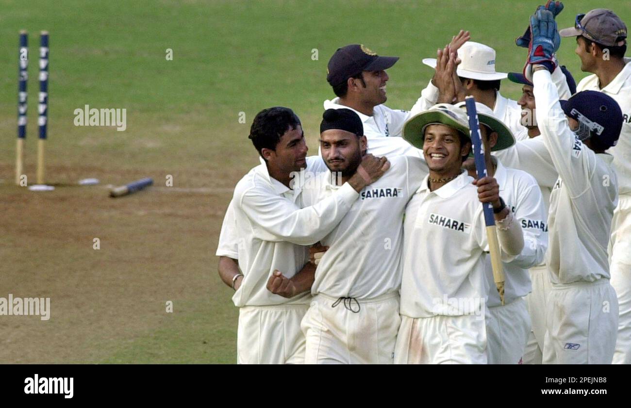 India's Harbhajan Singh celebrates with his team members after winning ...