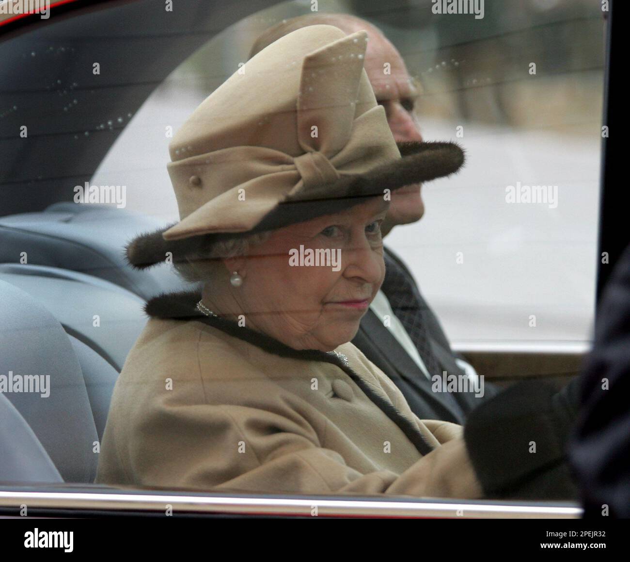 Britain's Queen Elizabeth II, front, and her husband Prince Philip ...