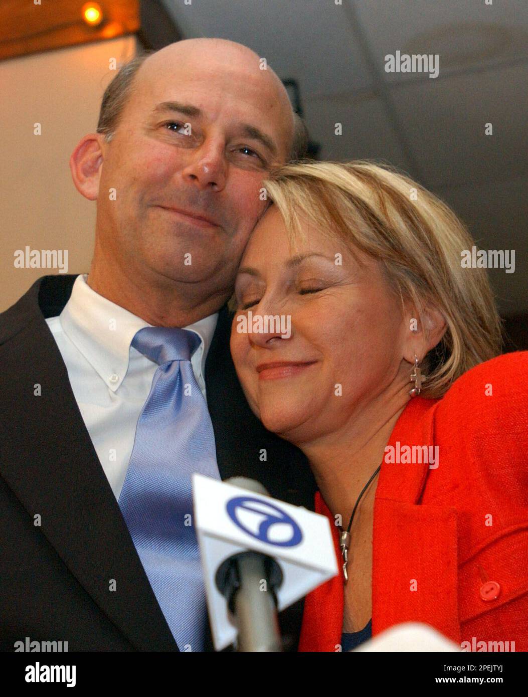 Louie Gohmert, R-Tyler, hugs his wife, Kathy, while addressing ...