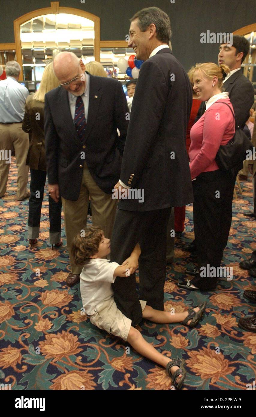 South Carolina Gov. Mark Sanford transports his youngest son, Blake, on ...