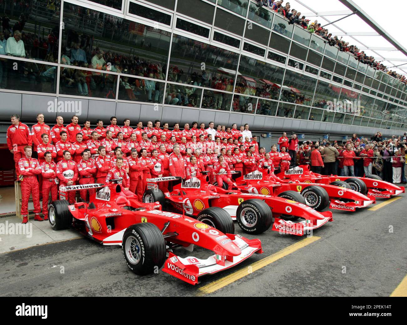 F1 Scuderia Ferrari team pose during a demonstration at the Monza ...