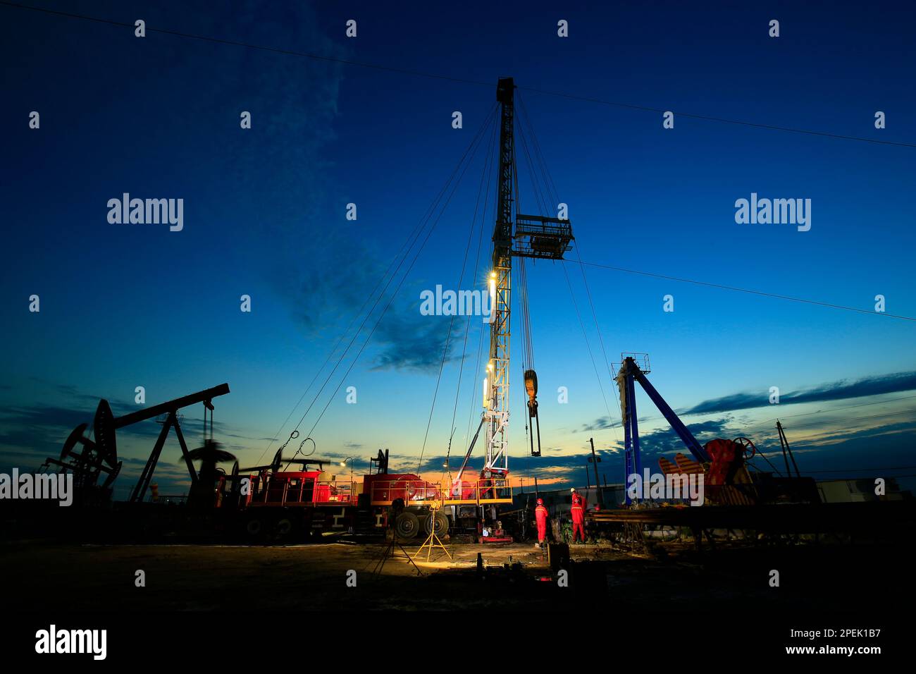 the oil workers are working Stock Photo - Alamy