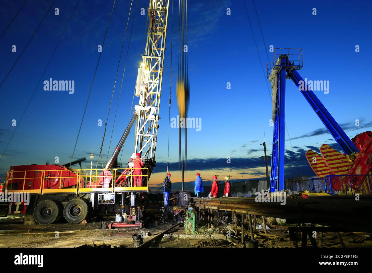 the oil workers are working Stock Photo - Alamy