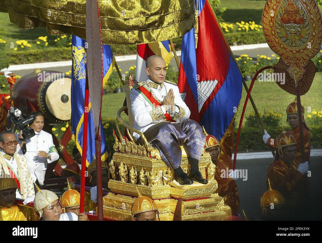 King Norodom Sihamoni is carried to the throne room at the Royal Palace ...
