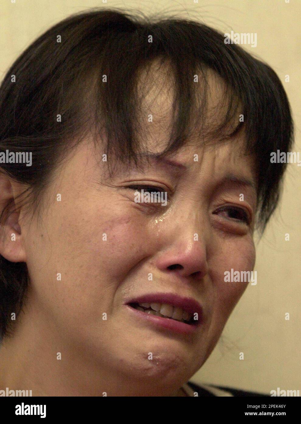 North Korean asylum seeker Hwang Keum-ran sobs as she speaks during an ...