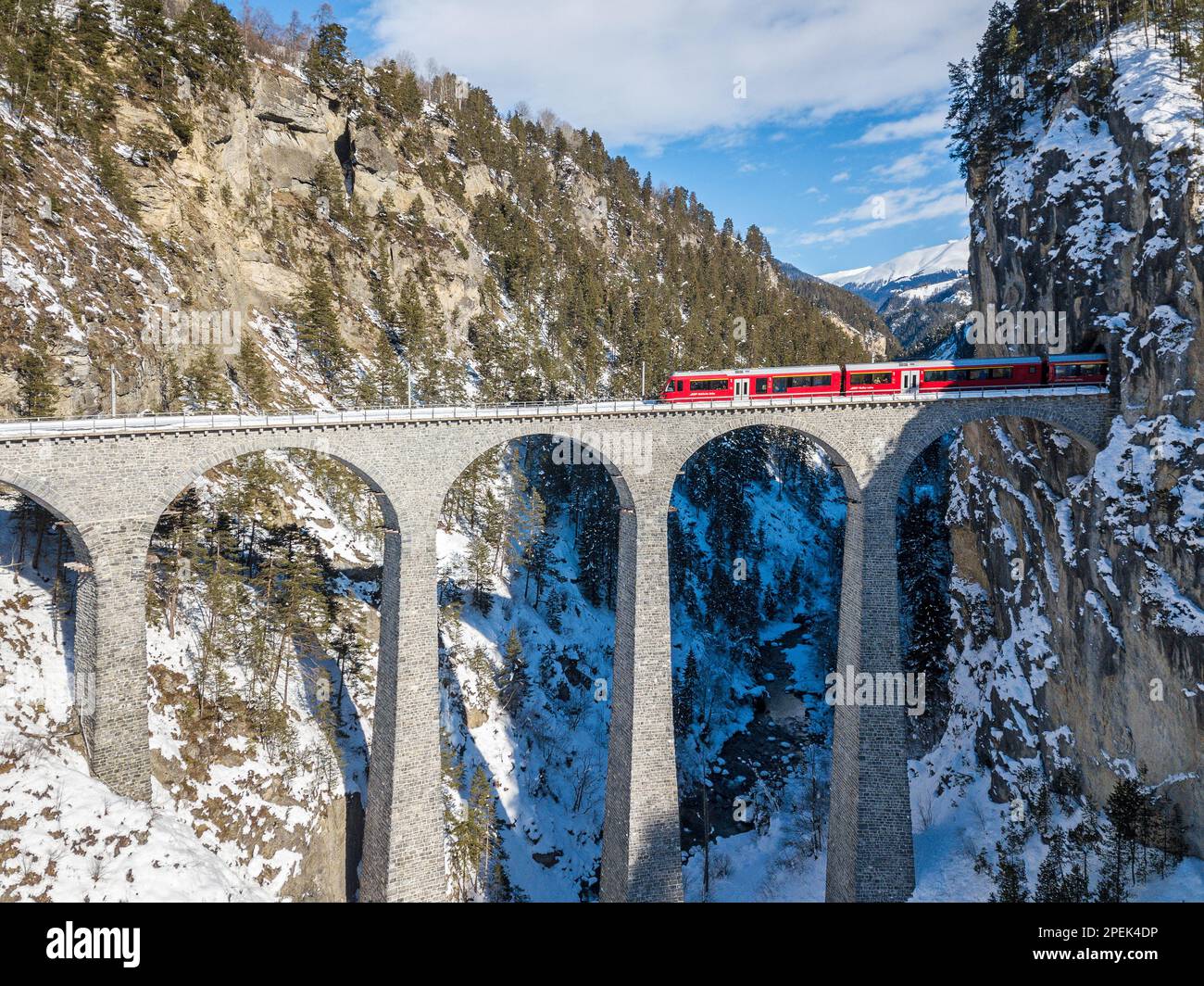 Filisur Switzerland - January 31. 2019: A red passenger Swiss train ...