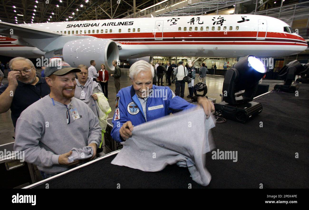 Retired Boeing Co. pilot Lew Wallick, right, who co-piloted the first ...