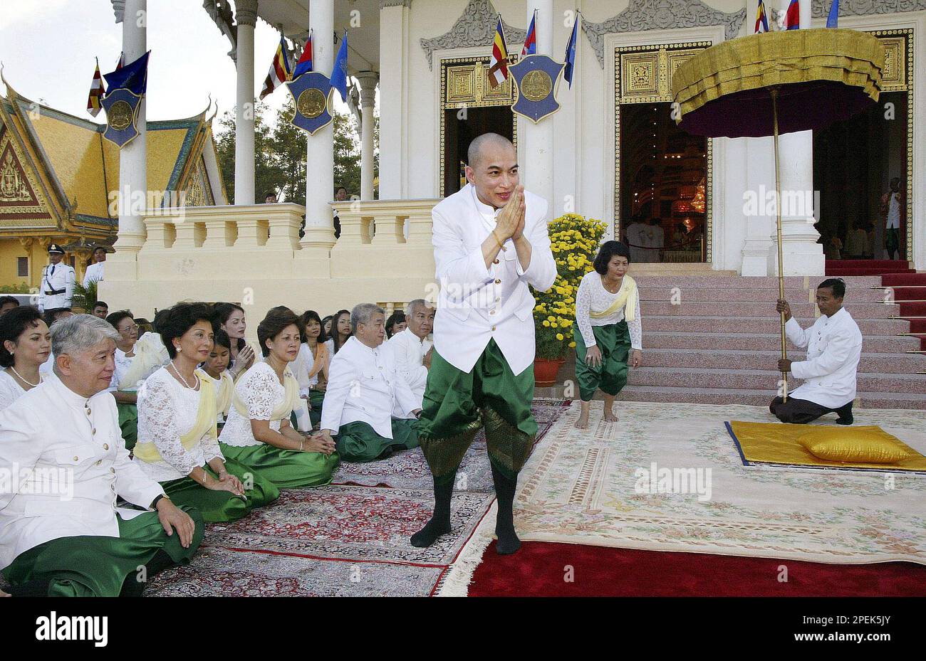 Cambodia's King Norodom Sihamoni greets royal family members during the ...