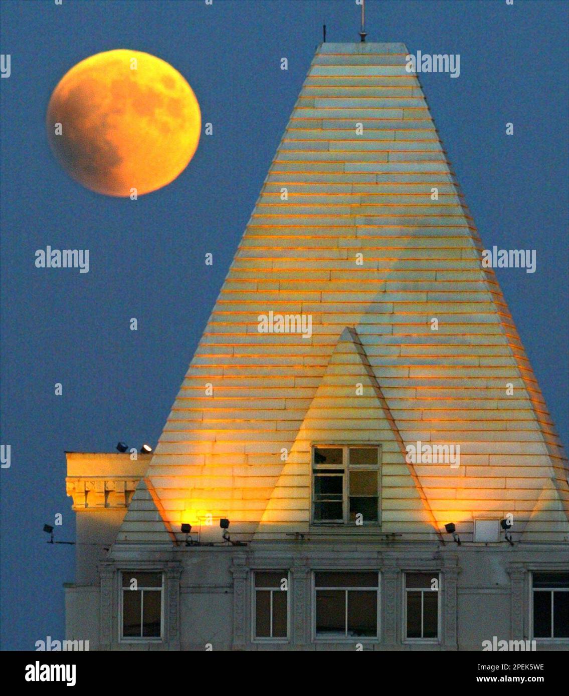 The moon is partially covered by the shadow of the Earth Wednesday ...