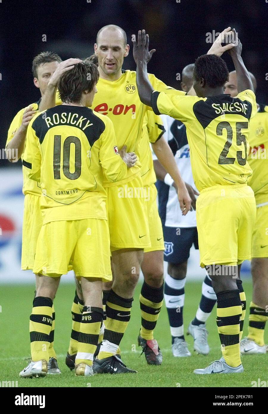 Dortmund player Jan Koller, center, from Czech Republic, receive the ...