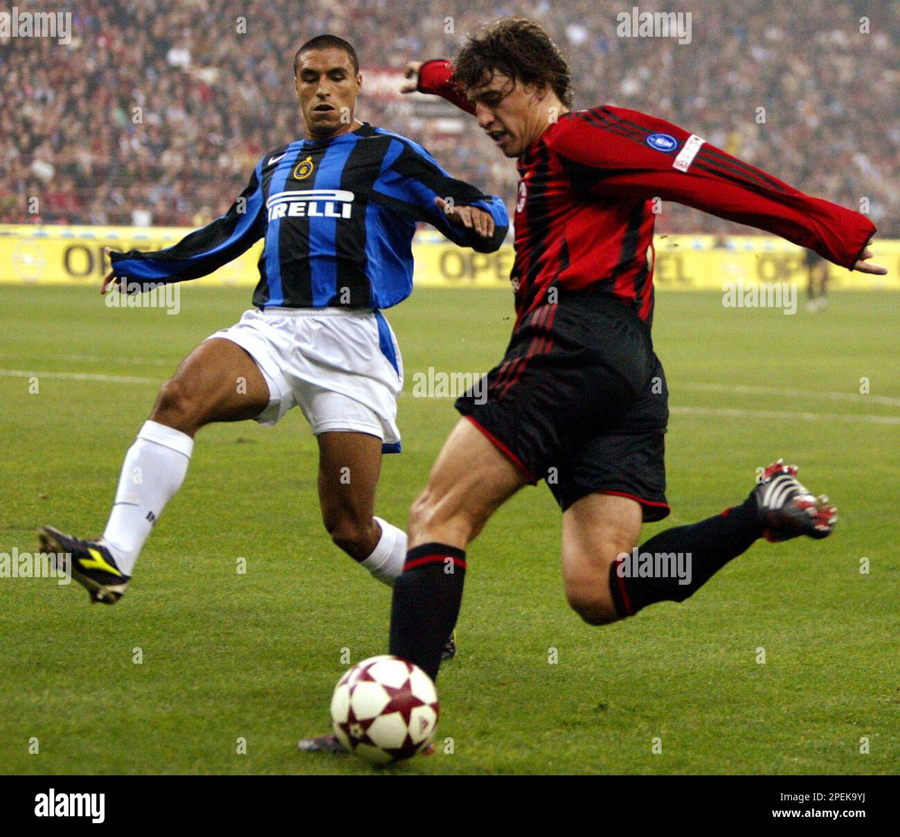 A.C. Milan forward Hernan Crespo of Argentina, right, challenges for ...