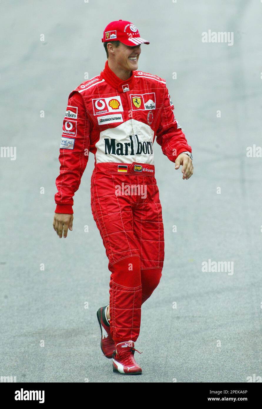 Ferrari's Michael Schumacher of Germany walks on the track of ...