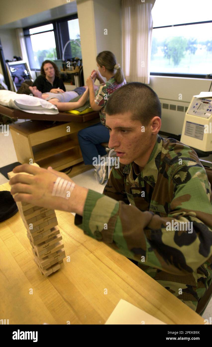**ADVANCE FOR WEEKEND RELEASE OCT. 23-24**Pfc. Daniel Baseman, front ...