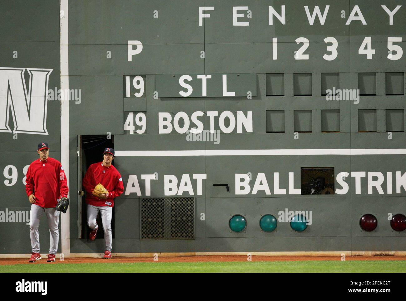 St. Louis Cardinals' Matt Morris, left, and Danny Haren emerge from ...