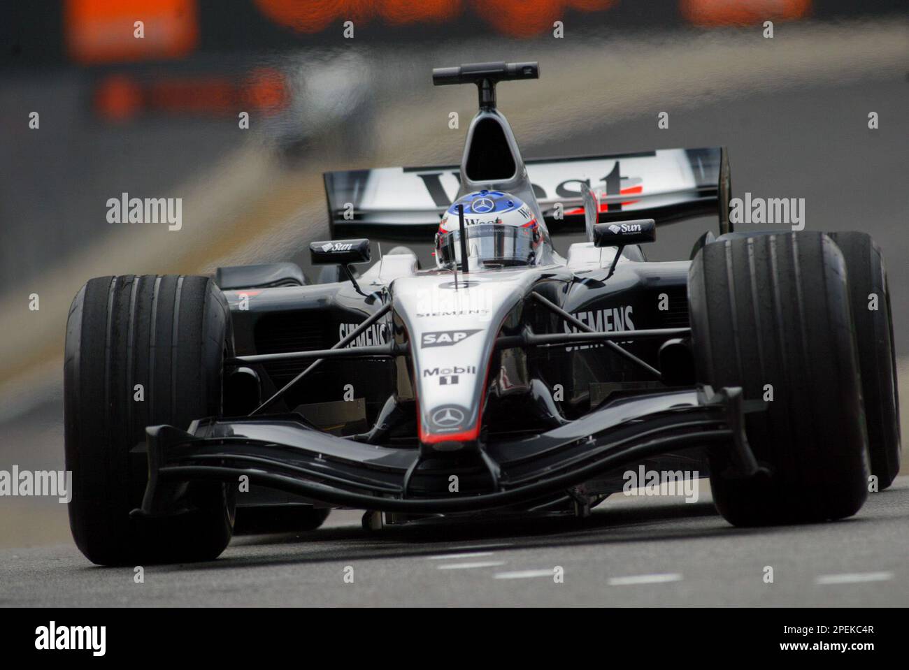 McLaren Mercedes' Kimi Raikkonen, of Finland, drives his car during a ...