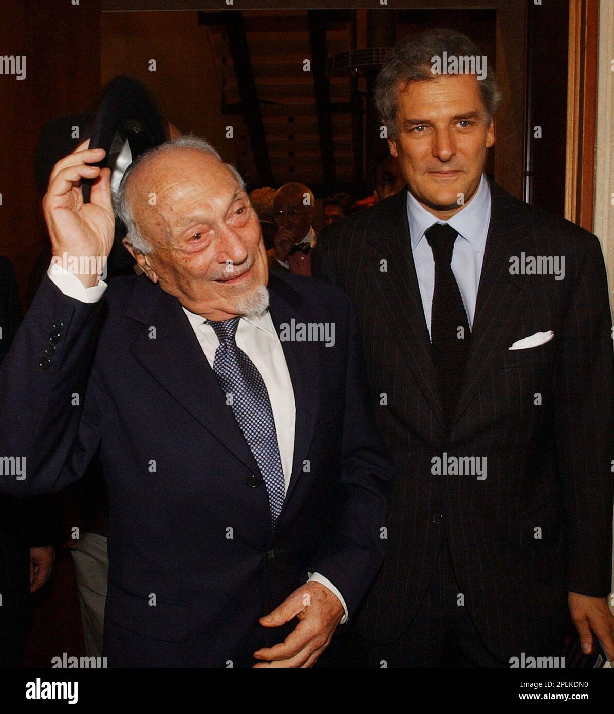 Former Rome's Synagogue Chief Rabbi Elio Toaff, left, leaves his cap ...