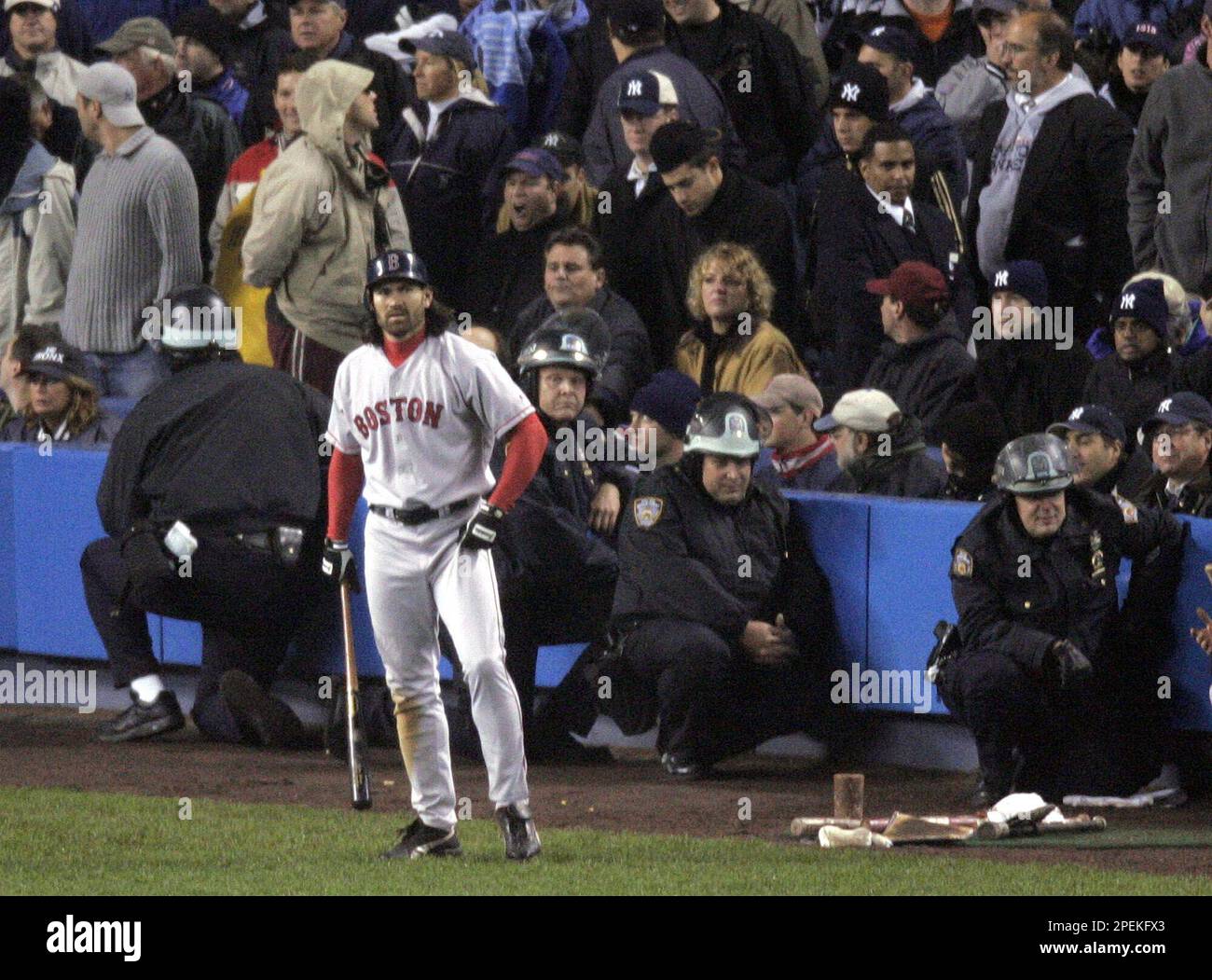 New York City Police officers line the field behind Boston Red Sox's ...