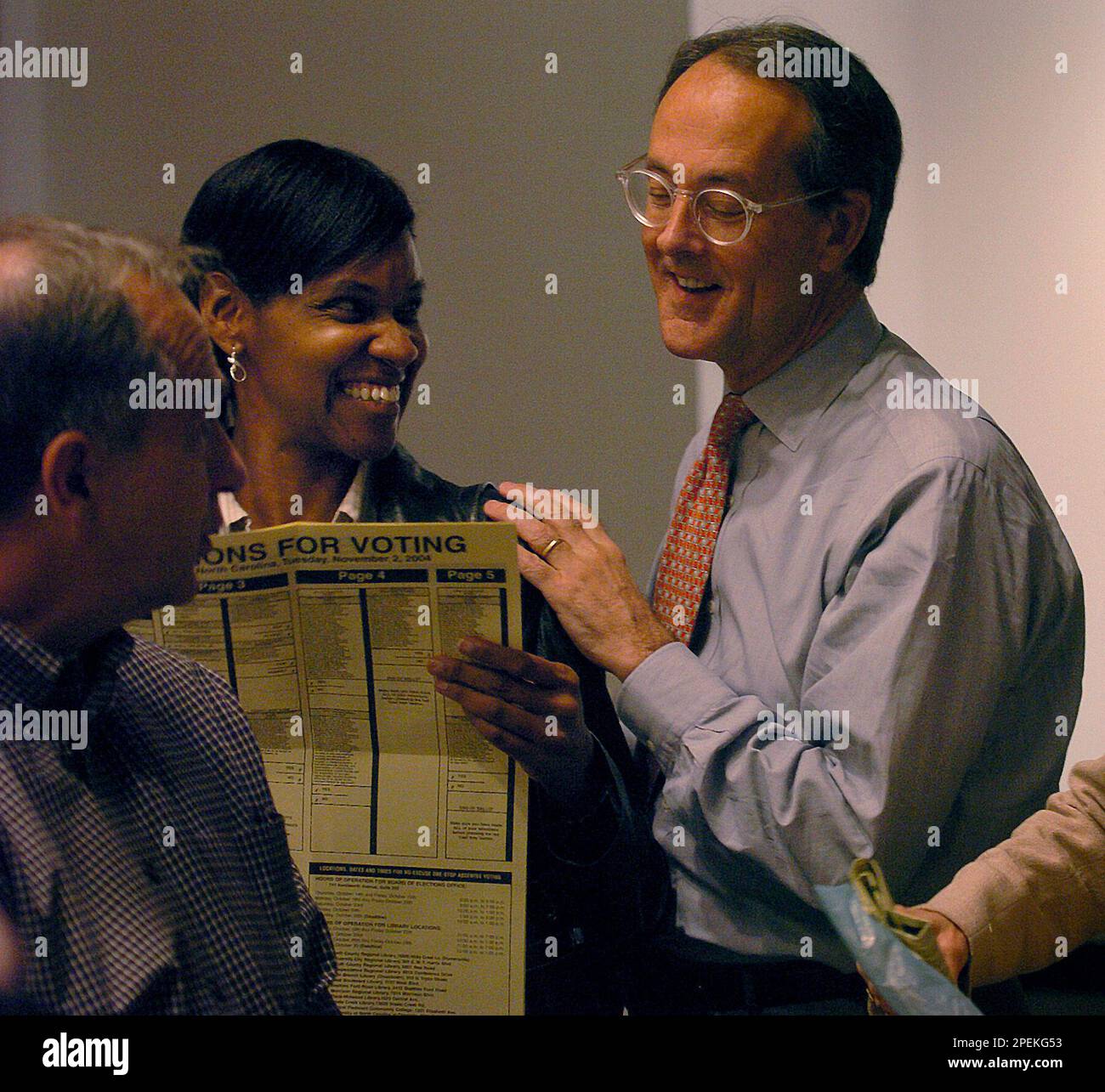 U.S. Senate candidate Erskine Bowles, right, laughs with voter Shauna ...