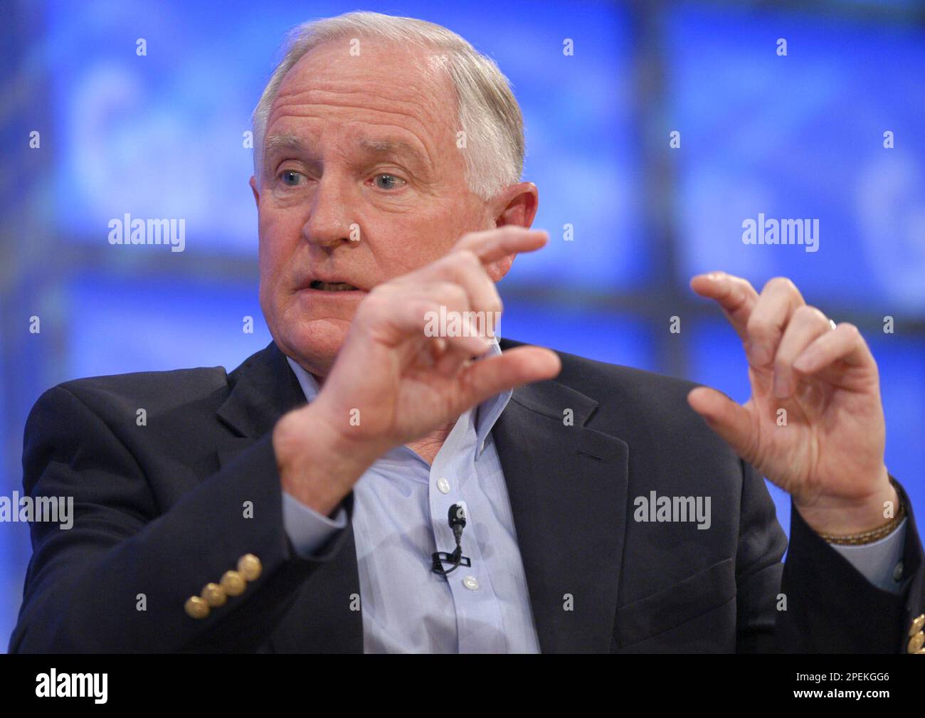 Intel CEO Craig Barrett gestures as he gives the keynote address during ...